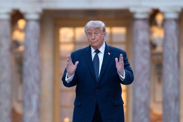 Trump signs Iran deal at dinner table in Versailles aiming to put an ...