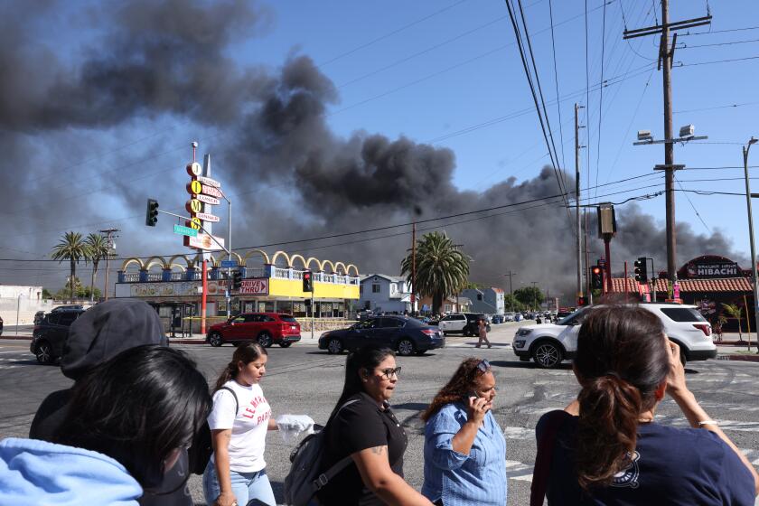 Crews battle massive Boyle Heights warehouse fire and ammonia leak ...
