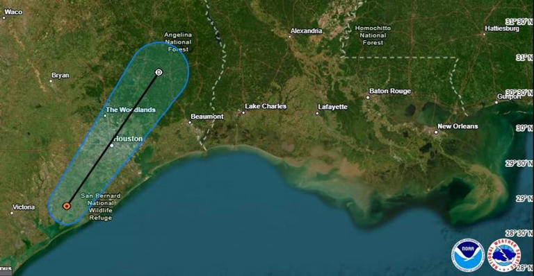 Arthur's center over land, most of its rain over Gulf