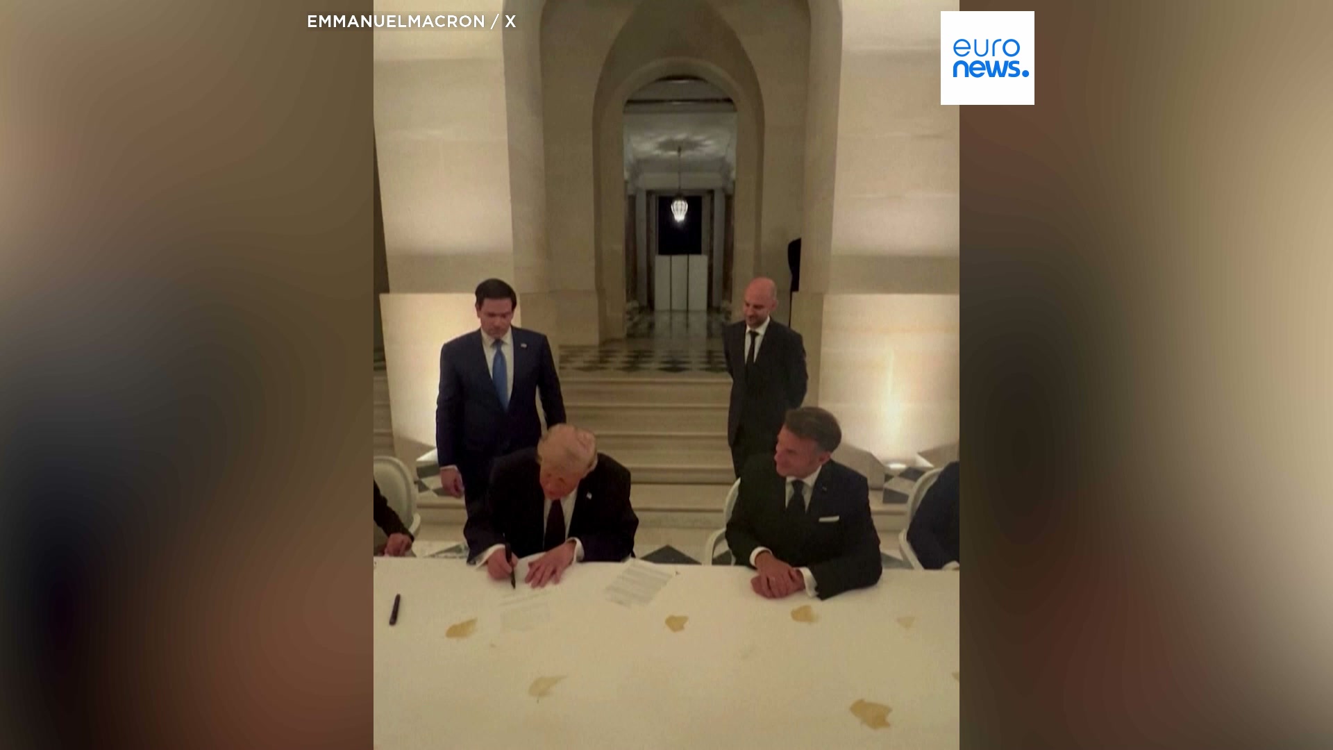 Moment Trump signs US-Iran deal at Palace of Versailles