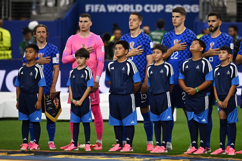 Why some teams stand sideways to sing the national anthem at the World Cup