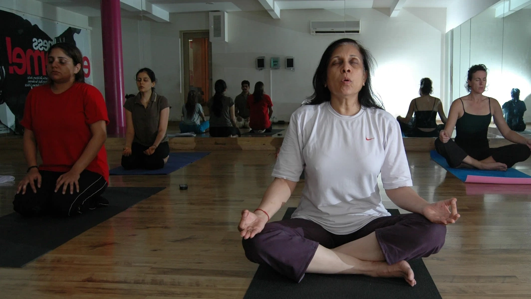 Experts highlight yoga's role in tackling workplace burnout
