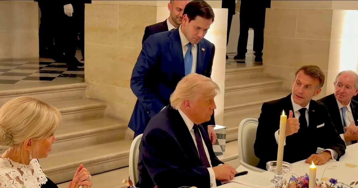 Moment Macron applauds as Rubio hands Trump the Iran MOU to sign at ...