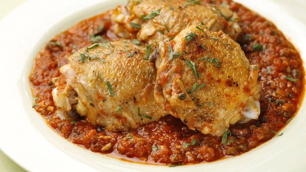 Why Alton Brown prefers chicken thighs over breasts