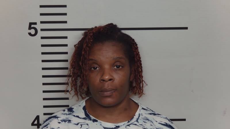 Woman arrested in connection with Russell neighborhood shooting