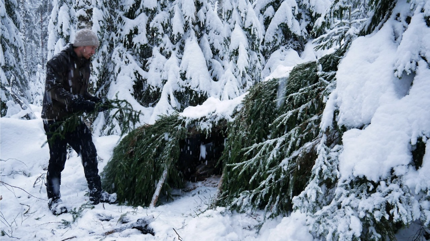 Frozen forest survival heavy snow shelter build bushcraft experience