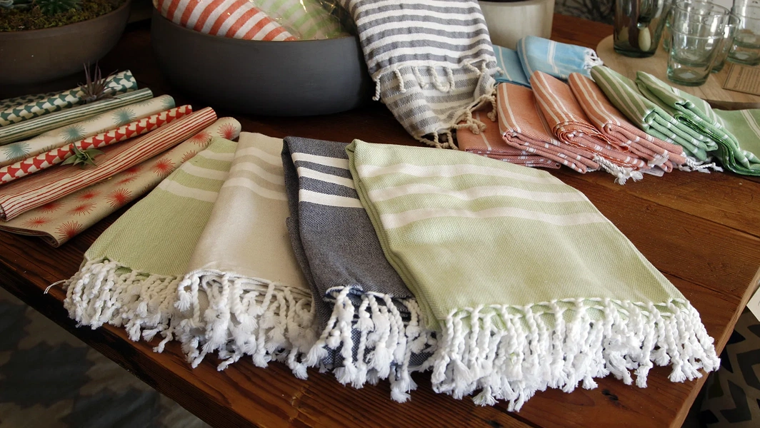 The purpose behind towel borders and stripes