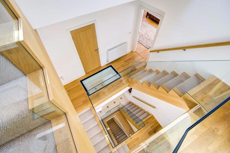 Gorgeous townhouse with stunning glass staircase and incredible cinema ...