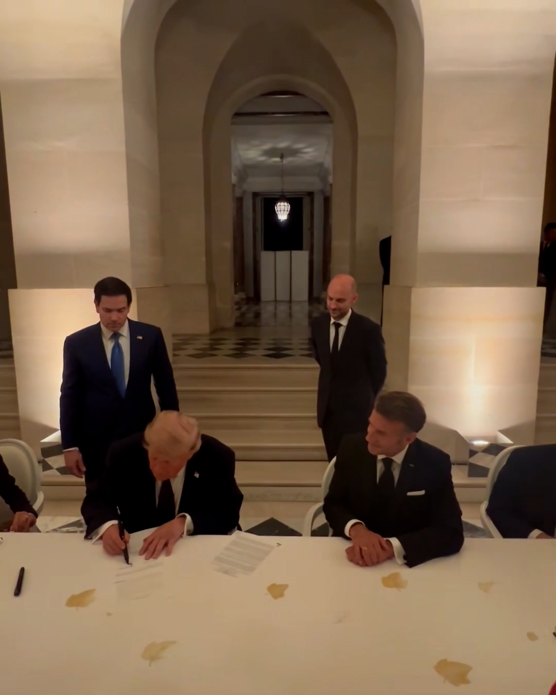 Trump signs US-Iran peace deal at Versailles