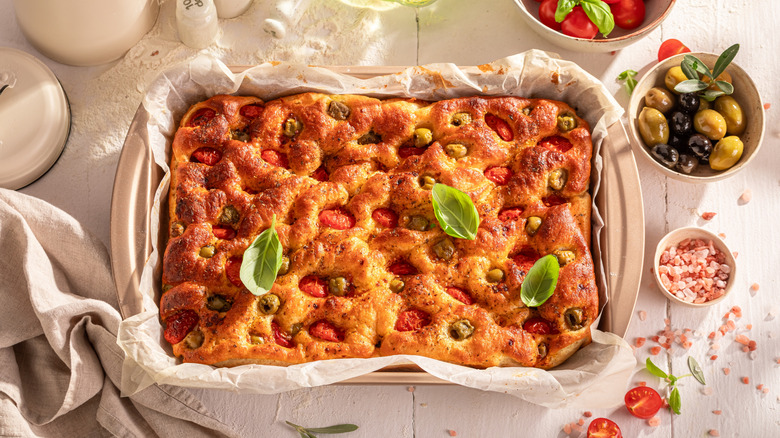 Transform store-bought frozen dinner rolls into cheesy focaccia pizza ...