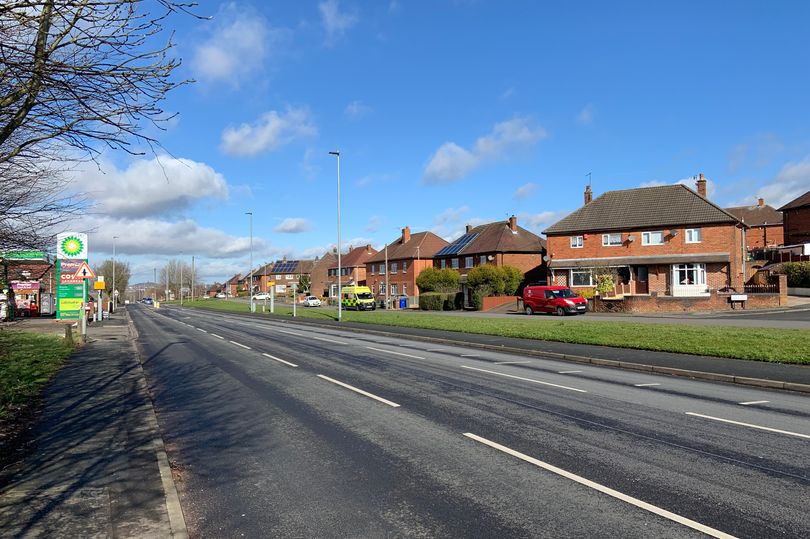 Woman in Royal Stoke as two ambulances and police on Stoke-on-Trent estate
