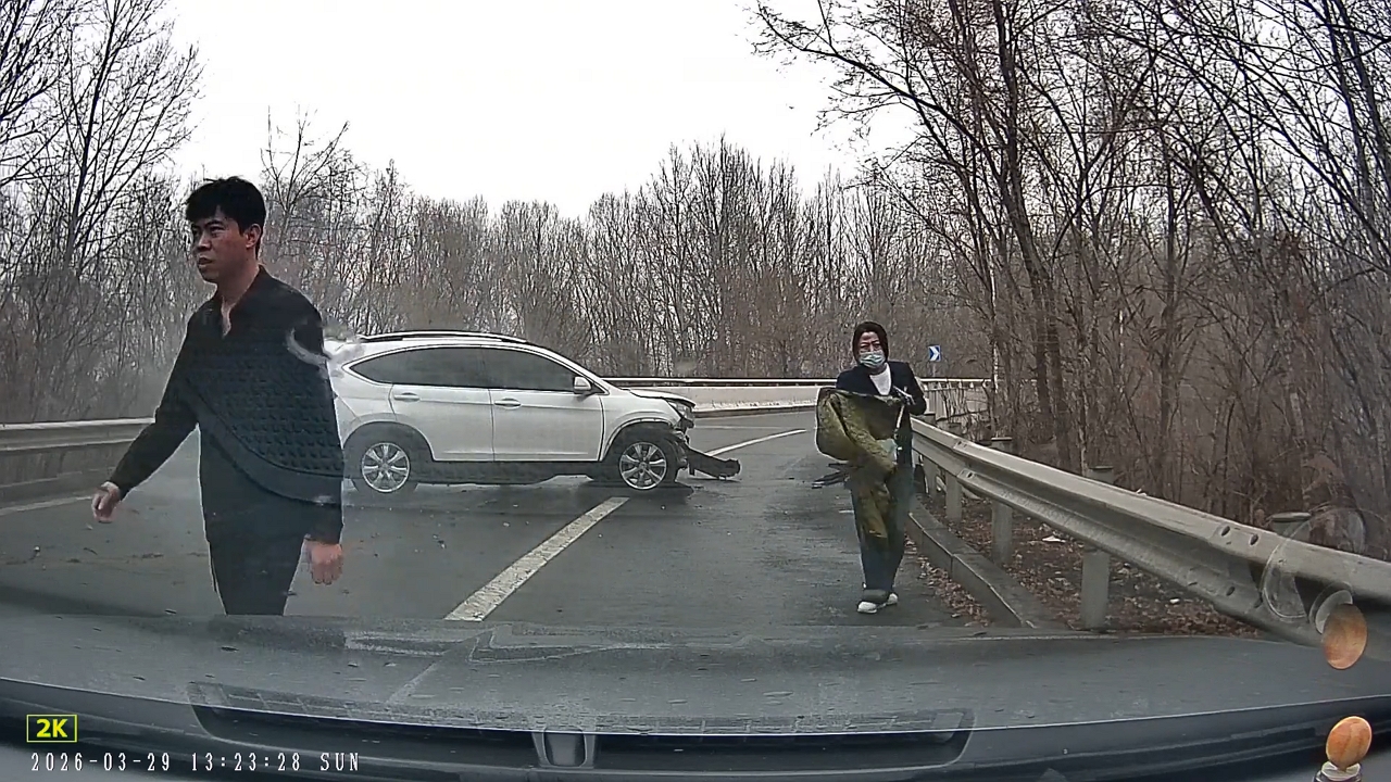 Car spins out after crashing into guardrail in China