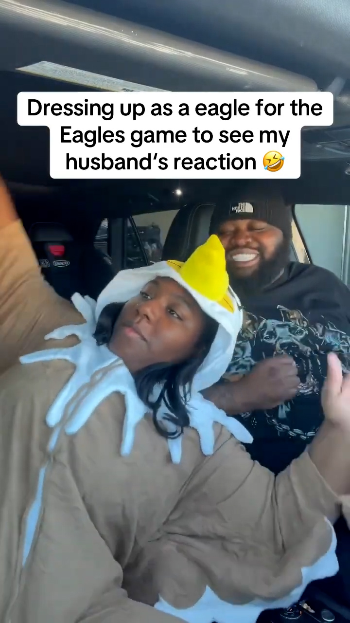 Dressing as an eagle for the game to catch my husband's reaction