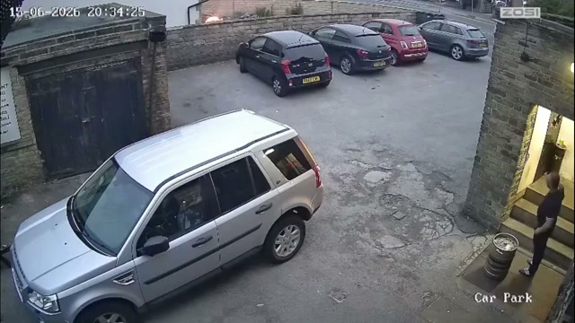 Moment SUV rams into two cars before smashing into pub outbuilding