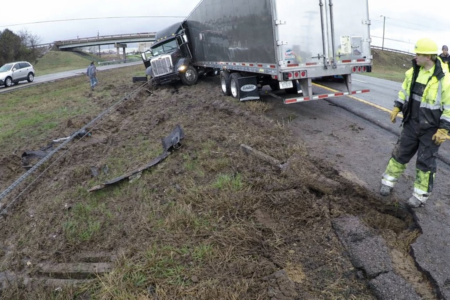 Jack-knifed, tangled, and wedged Peterbilt
