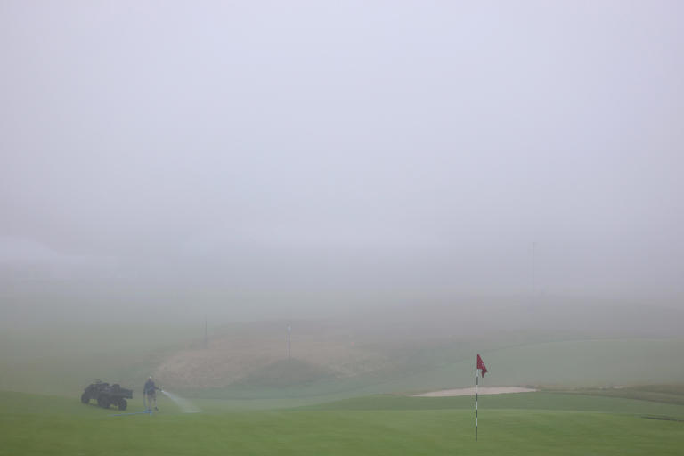 Photos: Shinnecock Hills disappears in fog, suspends 2026 US Open first ...