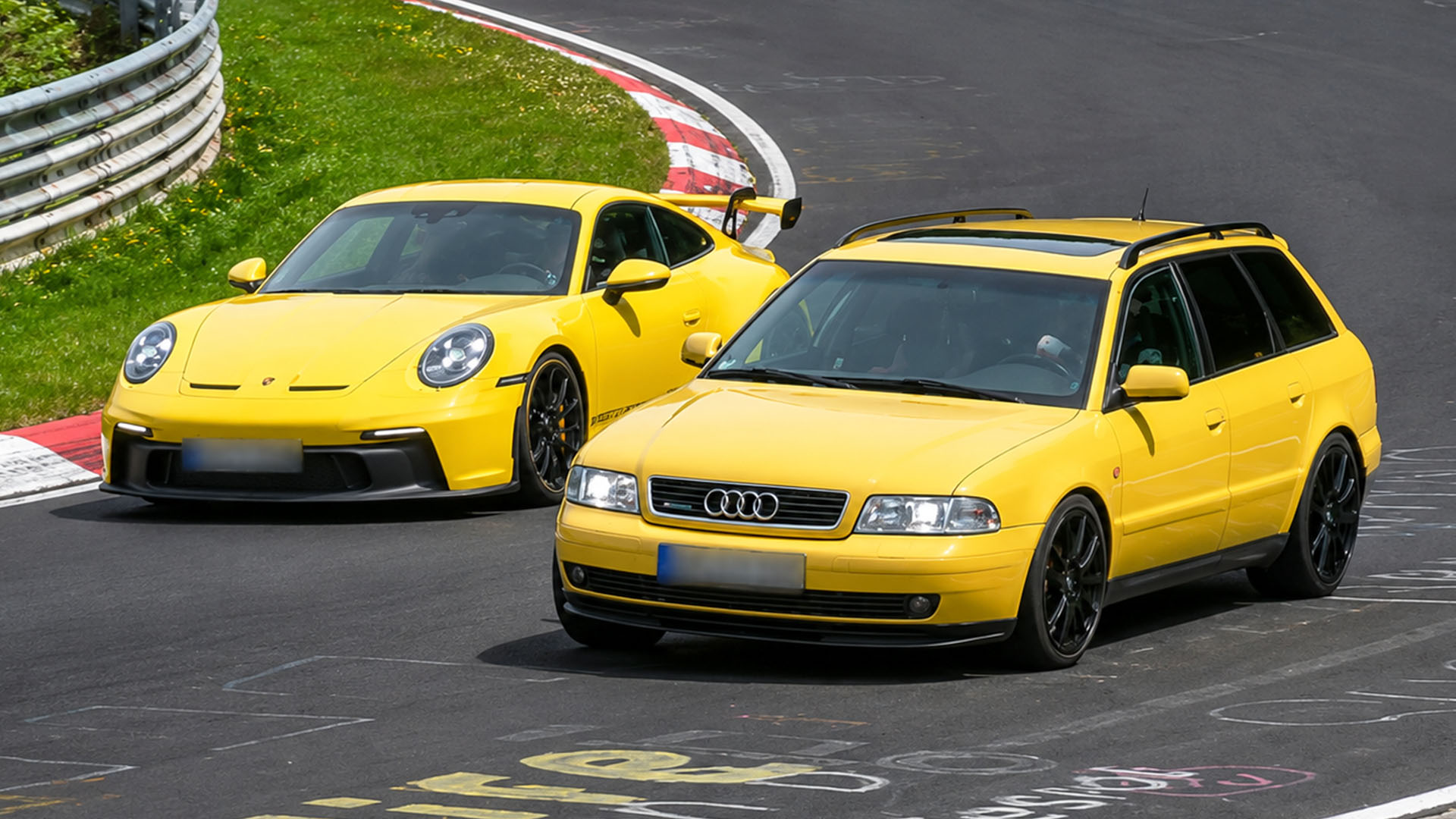 Drivers fight for control on a treacherous Nürburgring track