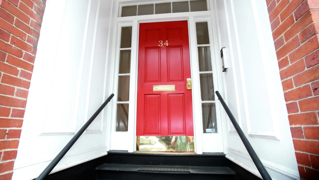 4 best and worst front door colors for white homes
