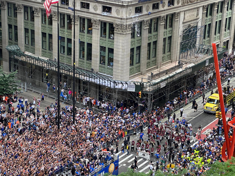 The hottest office perk in NYC today: a front-row view of the Knicks parade