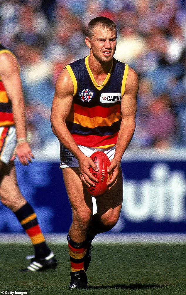 Footy great Tony Modra is left fighting for life after horror cattle ...