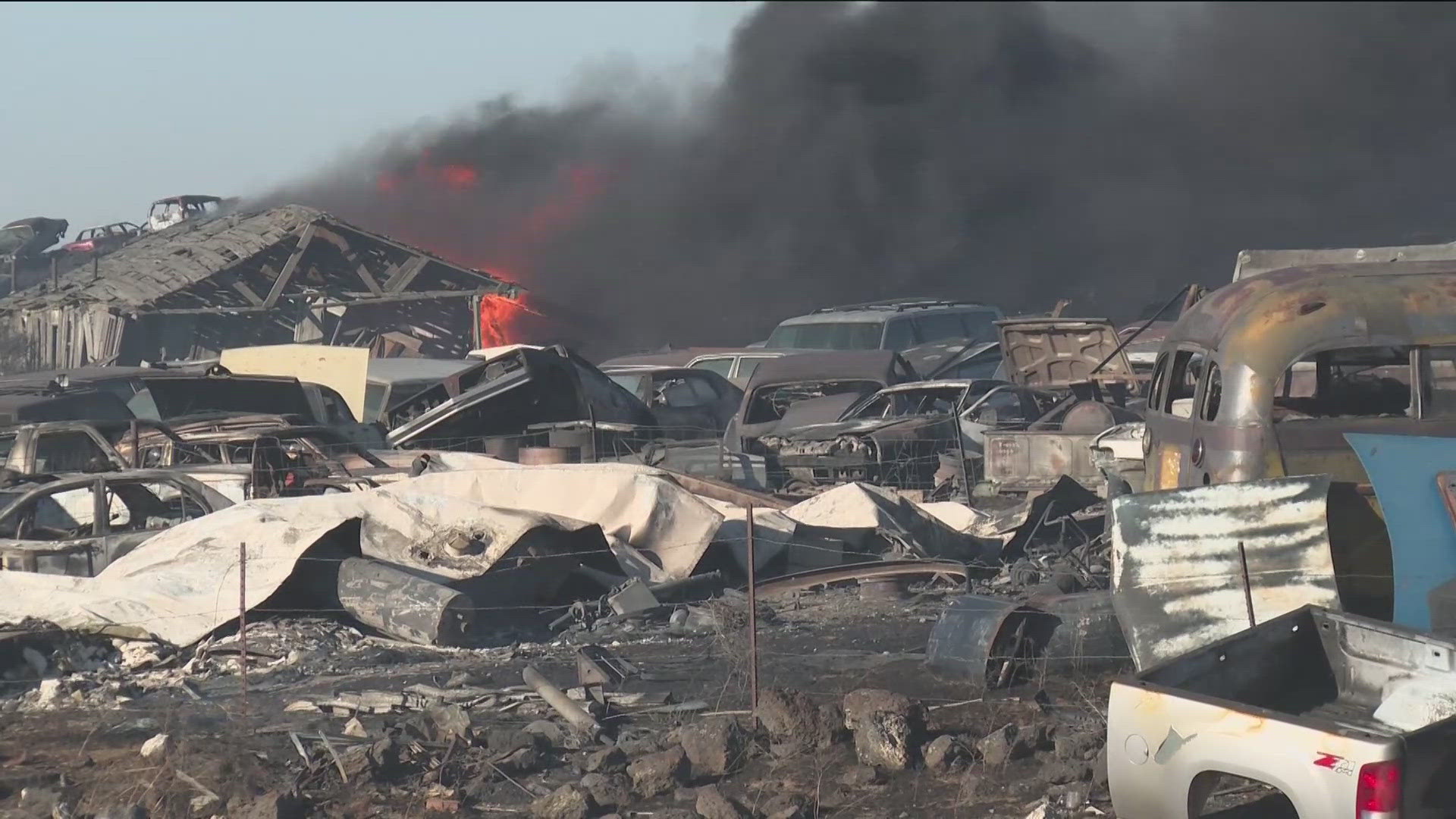 Median fire impacts power lines, burning cars and property
