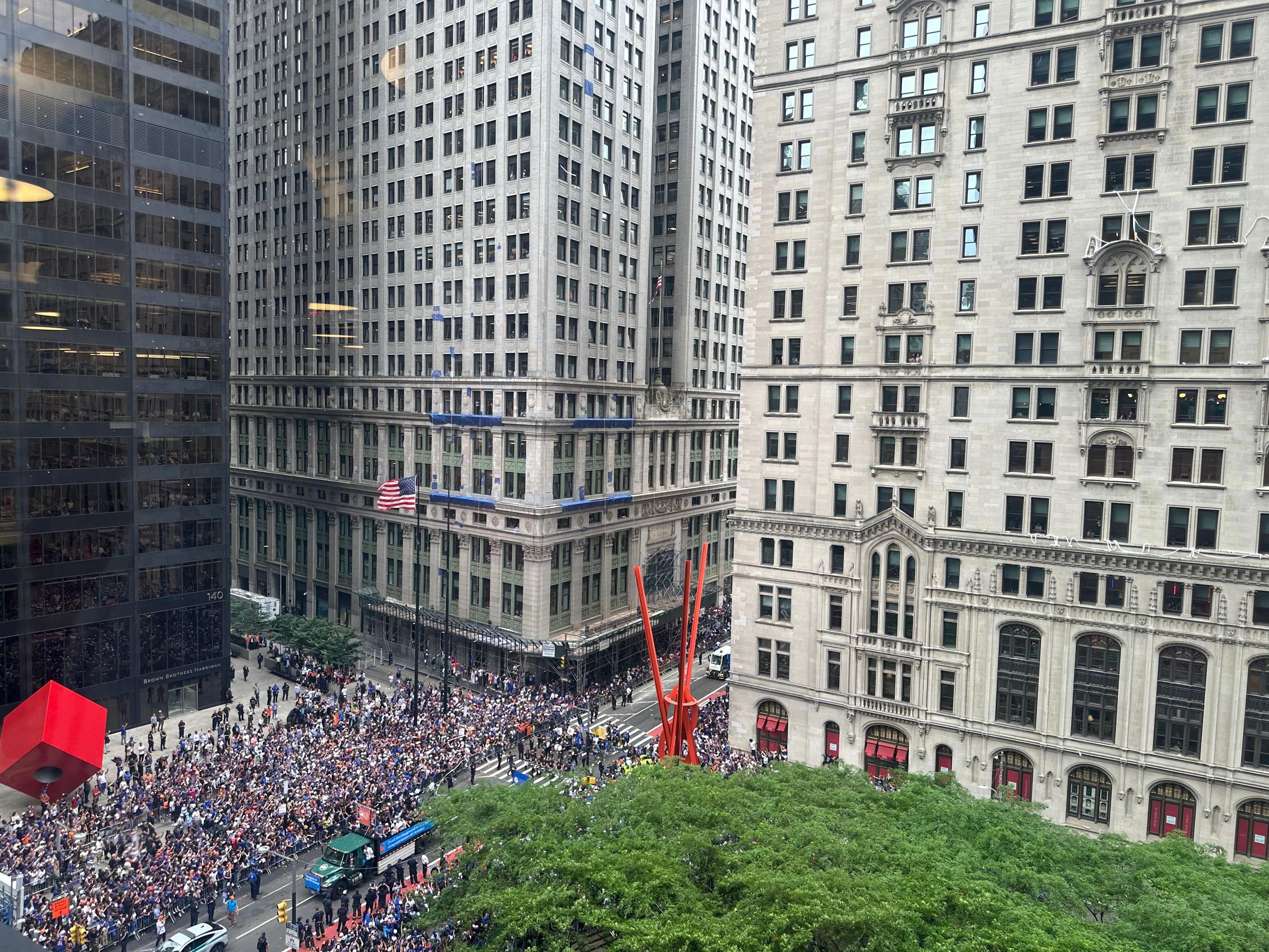 The hottest office perk in NYC today: a front-row view of the Knicks parade