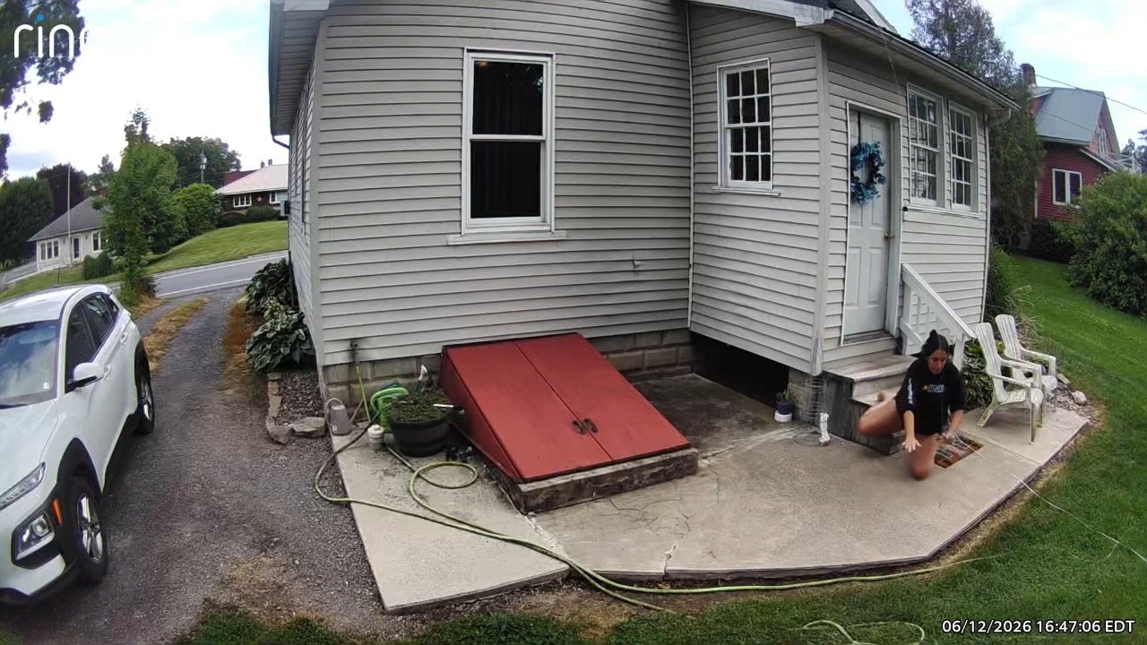 Girl slips on steps and rolls before standing
