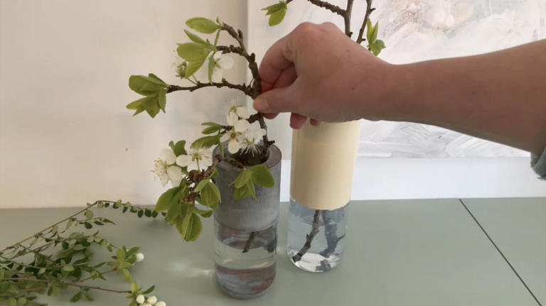 Save your empty glass jars and turn them into a stylish cement vase