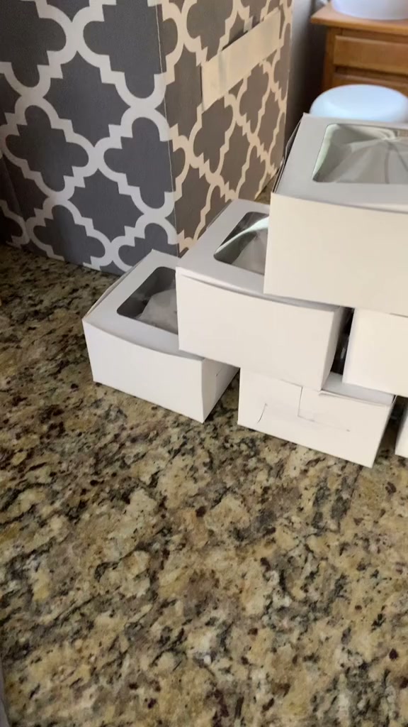 Filling cookie treat boxes for my stepson and his friends