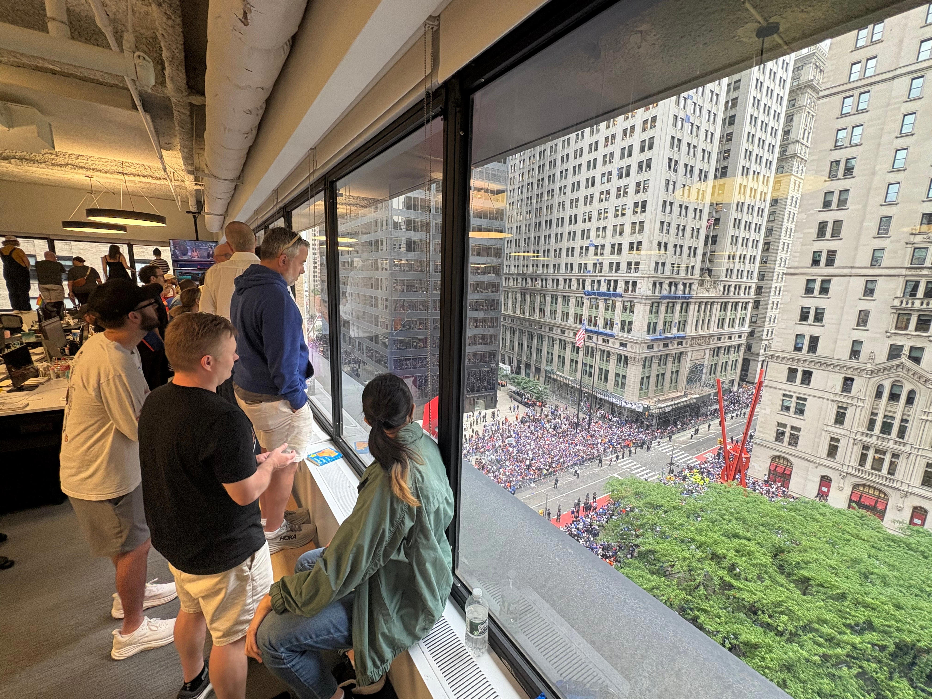 The hottest office perk in NYC today: a front-row view of the Knicks parade