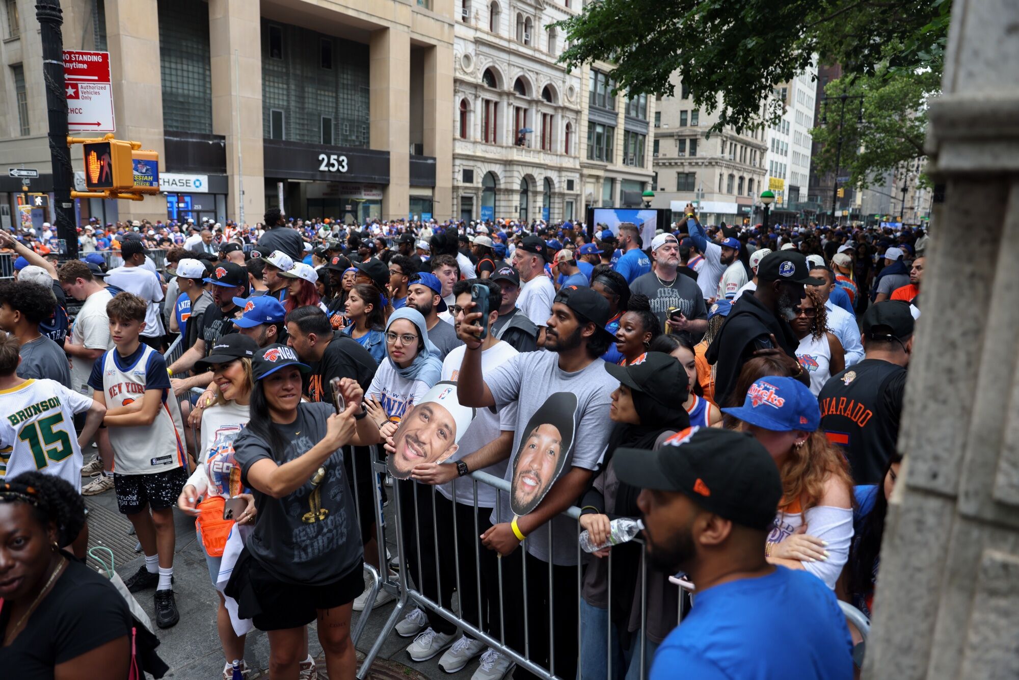 NYC Knicks parade packs downtown with fans, cops, confetti
