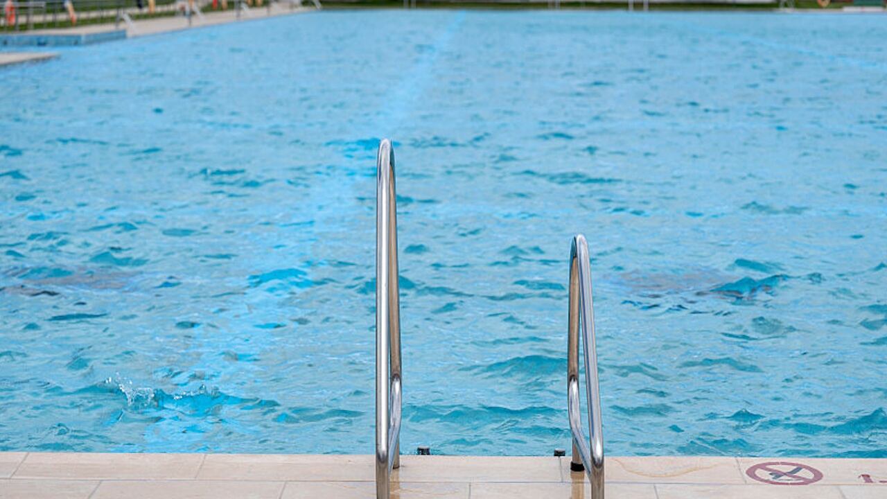 Motorist attempting to park drives Tesla into community pool