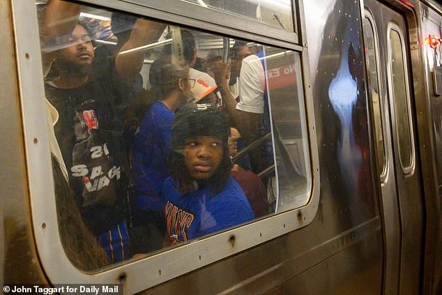 Knicks fans are rushed to hospital and NYPD shuts chaotic Manhattan as ...