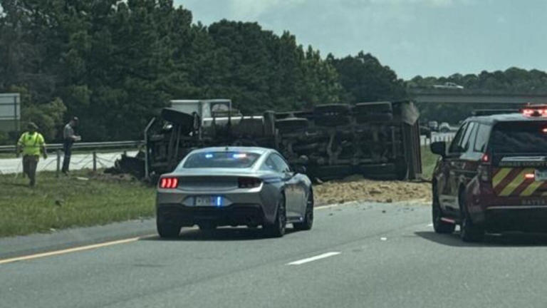 1 injured after dump truck carrying sand overturns on Highway 31 in ...