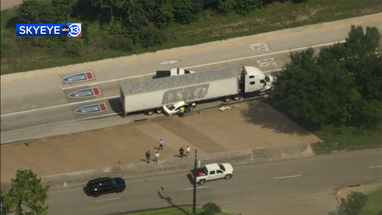 SkyEye13 shows crash aftermath involving big rig and car on East Loop