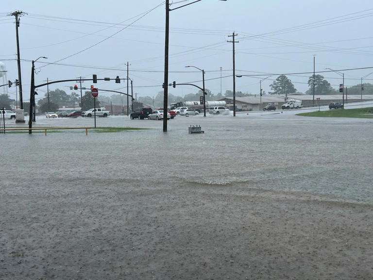 Road crew member killed as tropical storm remnants cause flooding ...