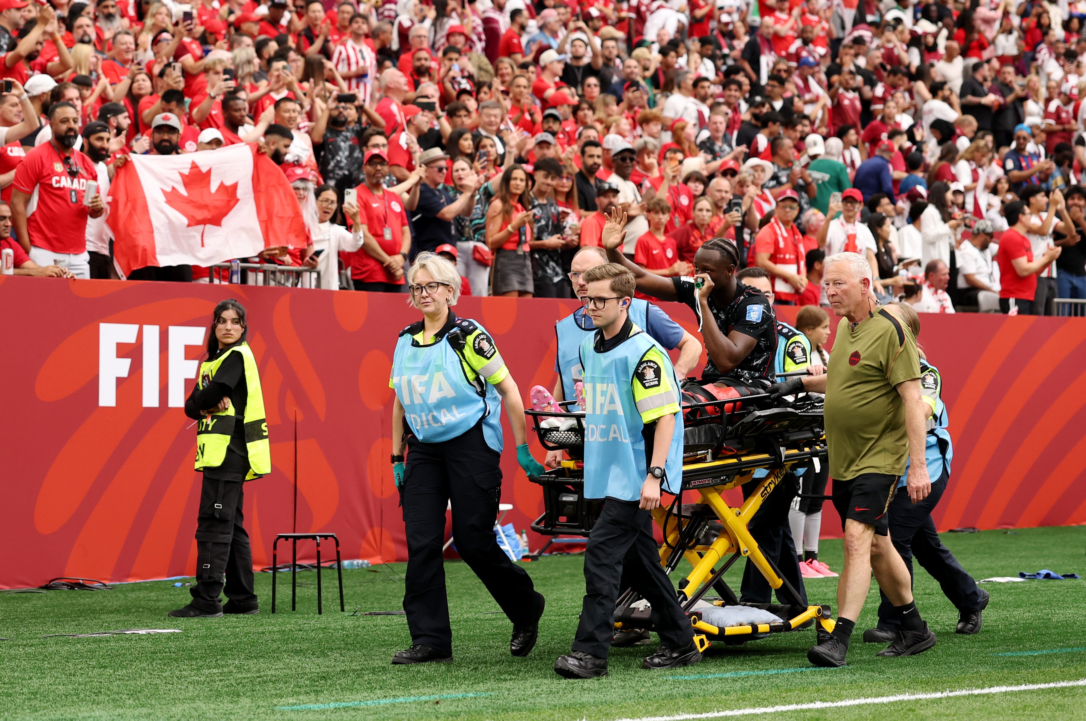 Ismael Kone waves to crowd after Canada injury at World Cup | Photos