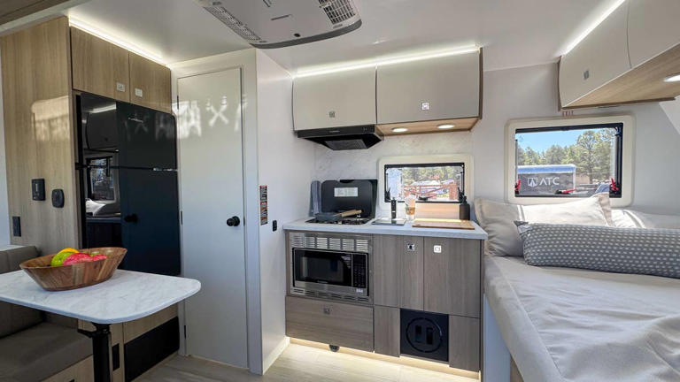 This compact off-road camper has two kitchens and a full bathroom