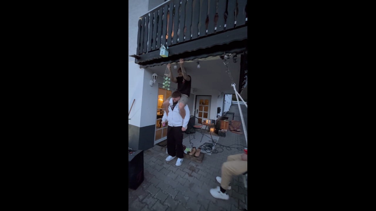 Hilarious fall while hanging outdoor lights in Germany