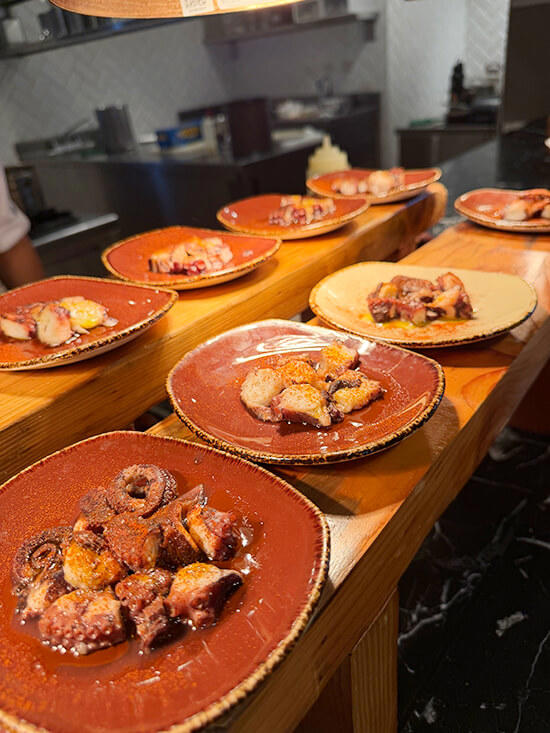 How chef Chele Gonzalez taught me to cook pulpo at Enye