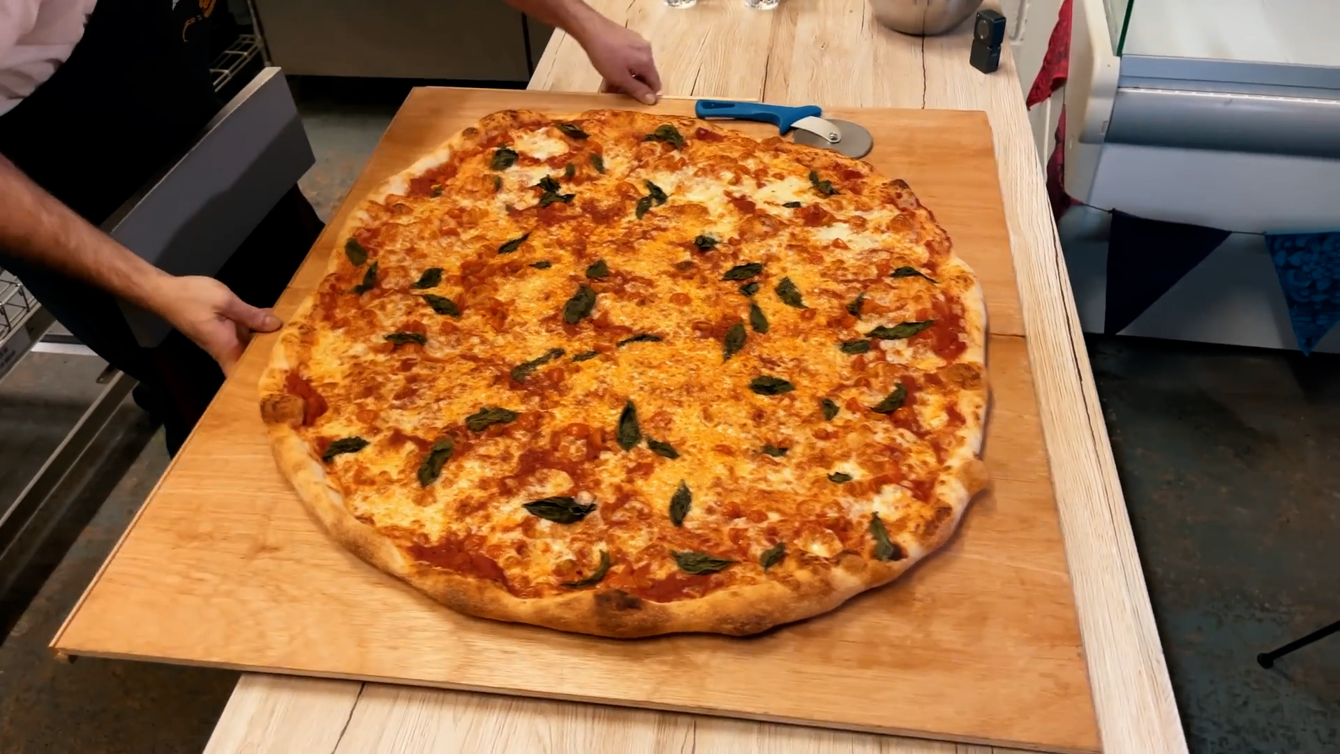 Two pro eaters try to beat a pizza challenge no team had ever finished