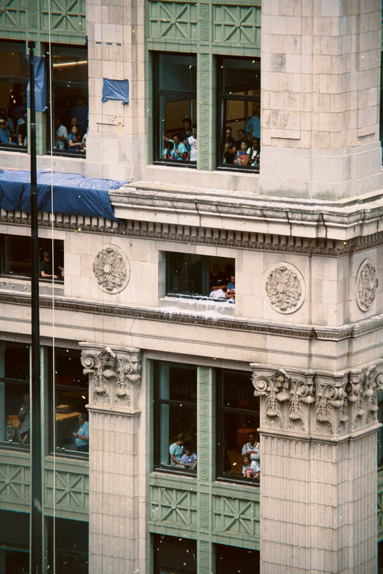 The hottest office perk in NYC today: a front-row view of the Knicks parade