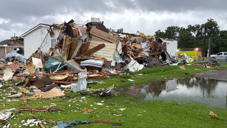 Woman pinned to sofa as tornado tears through Avondale
