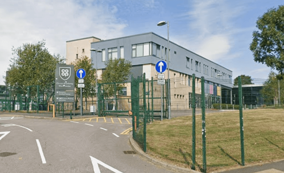 Manchester school in lockdown with pupil arrested after three people ...