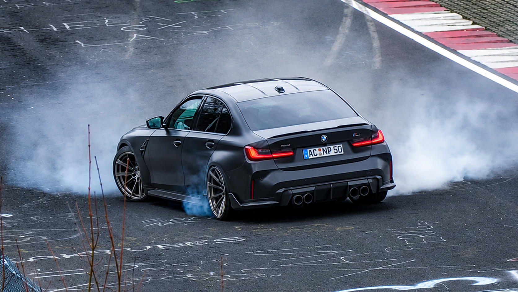 BMW spins violently after losing control at speed