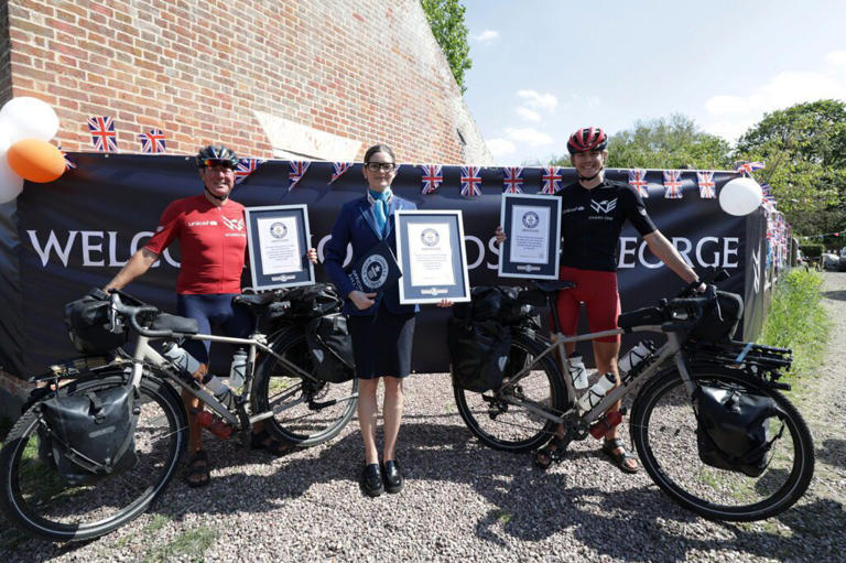 Father and son break world records after 18,000-mile cycle around the world