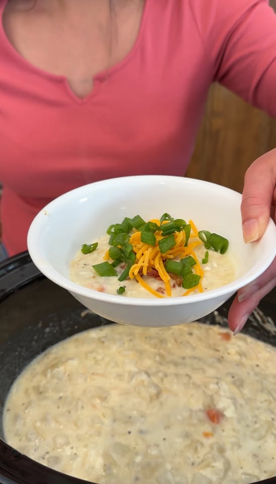 Loaded crockpot potato soup that tastes like pure comfort in a bowl