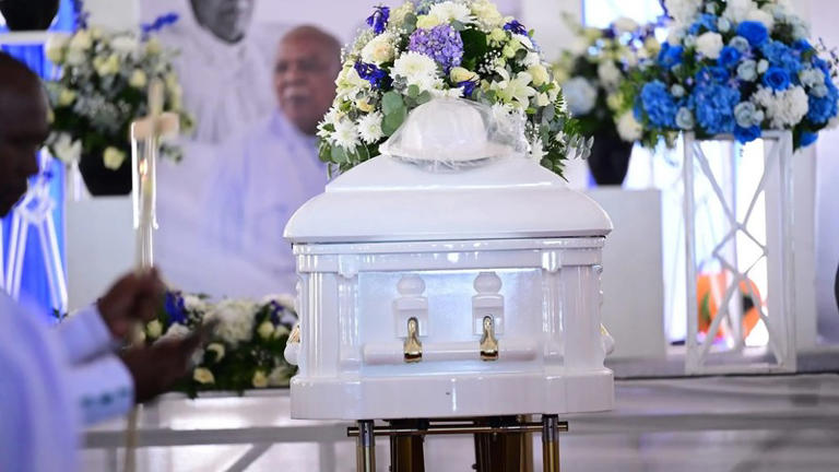 Bricks found in coffin after court halts church president's funeral