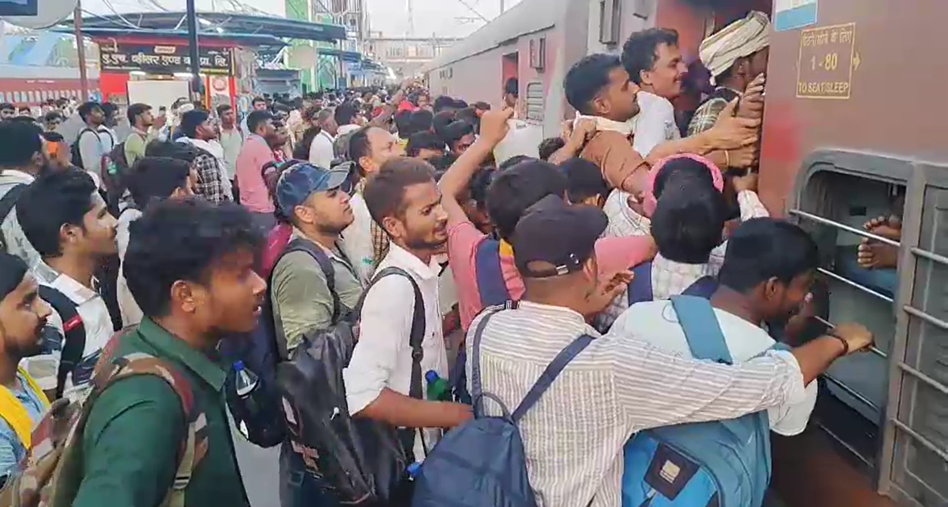 Watch: UP police exam sparks travel chaos, massive crowds at train stations