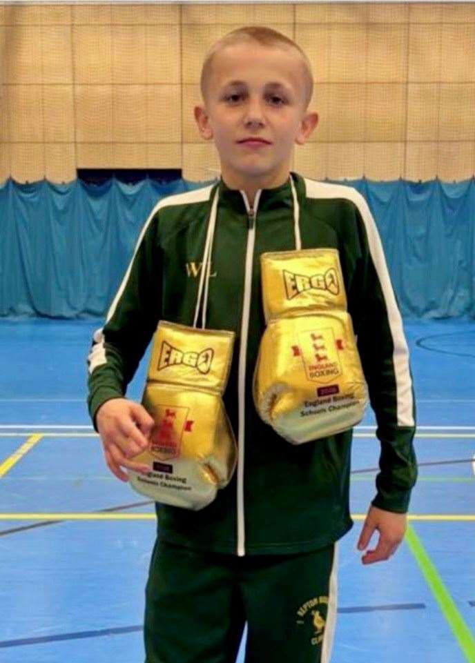 Dartford’s Wayne Lee, 12, of Repton Boxing Club in London, seals his ...
